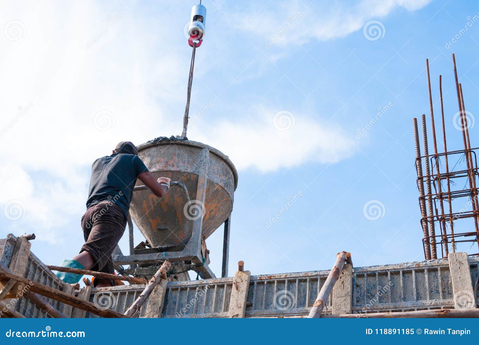 Construction Building Workers at Construction Site Pouring Concrete in ...
