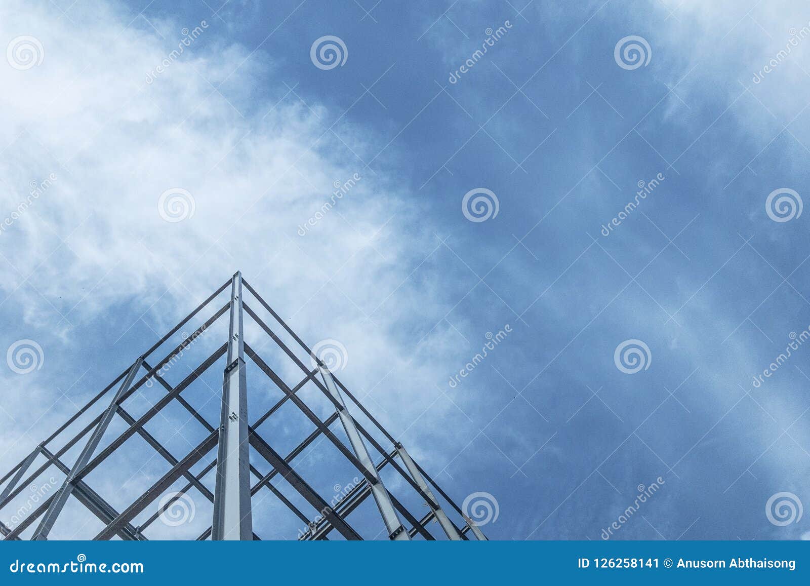 The Construction of Buildings with Steel Structure on Sky Background ...