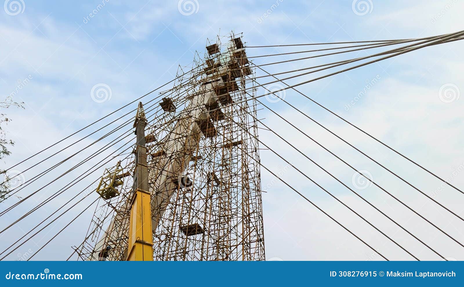 Construction of a Cable-stayed Bridge with a Crane and Scaffolding ...
