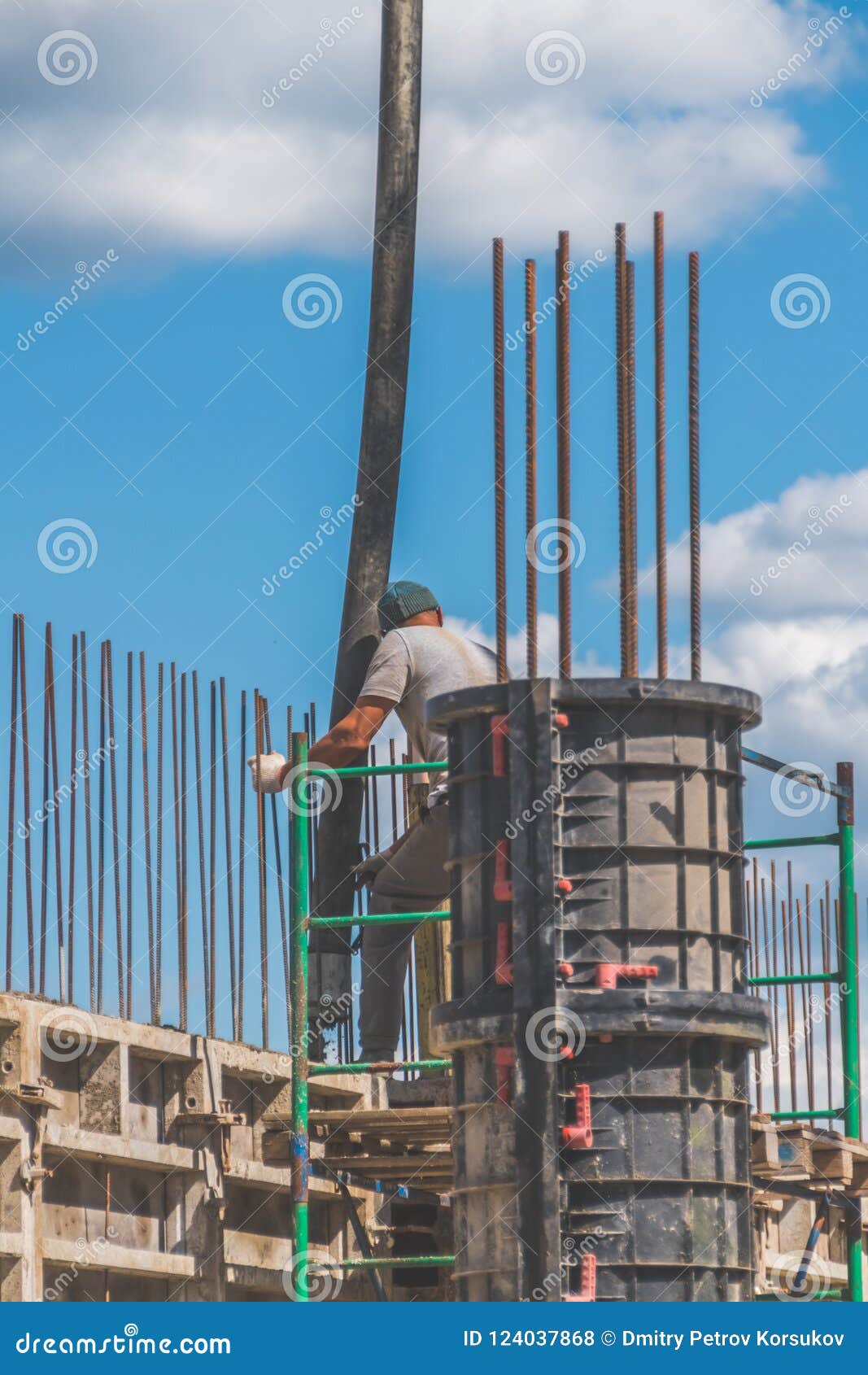 The Construction, Cement Pouring with Machine into the Frame of Stock ...