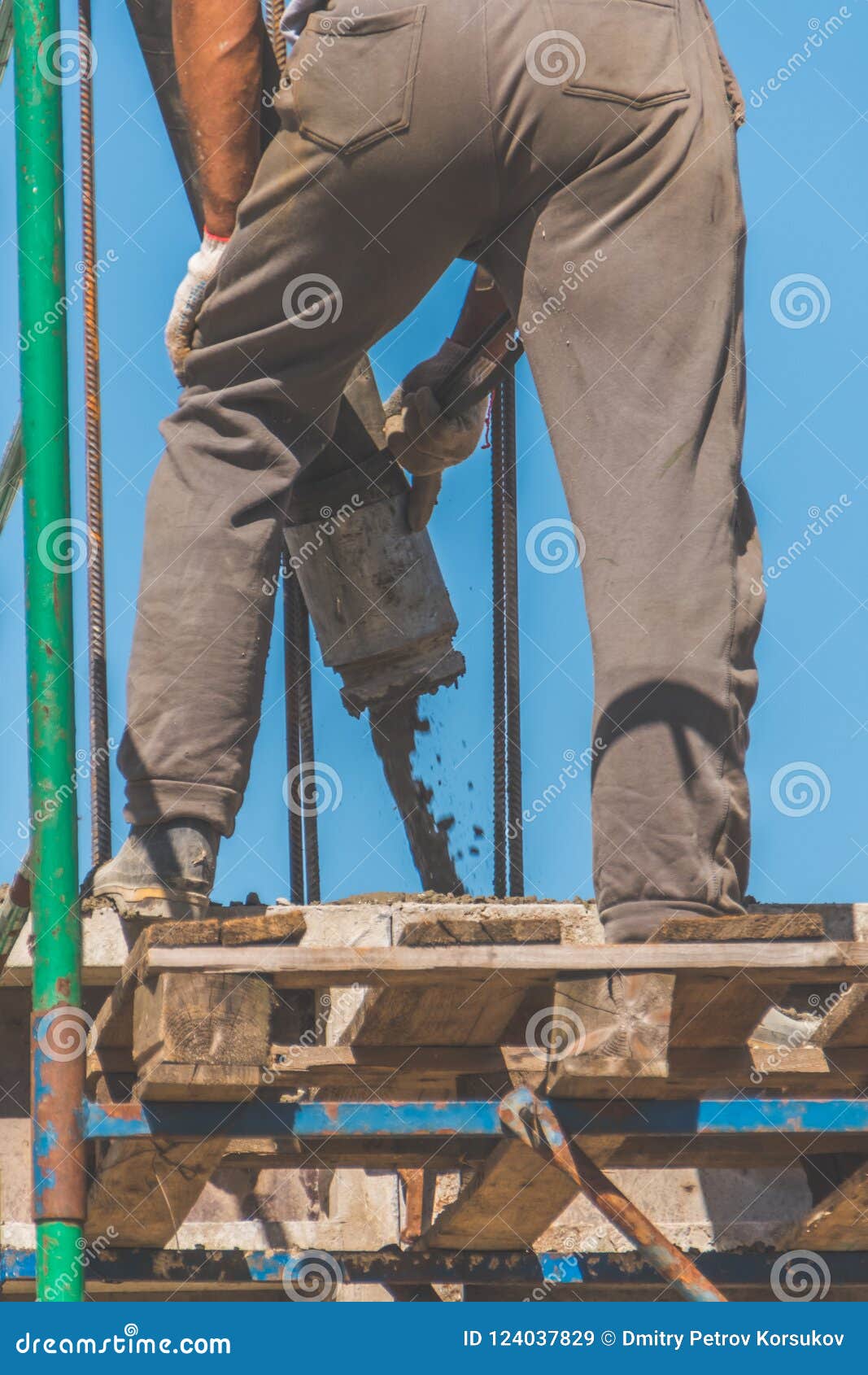 The Construction, Cement Pouring with Machine into the Frame of Stock ...