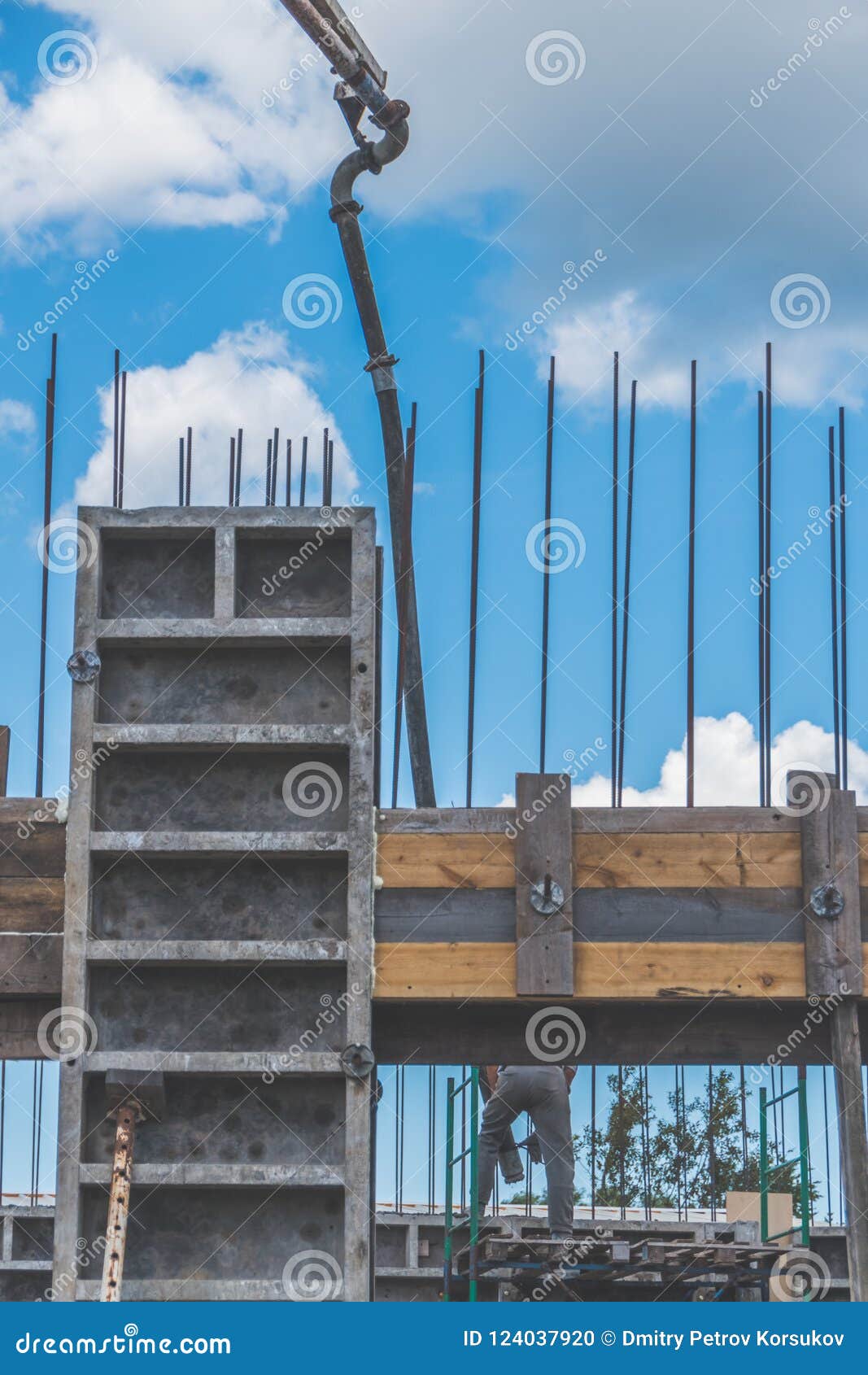 The Construction, Cement Pouring with Machine into the Frame of Stock ...