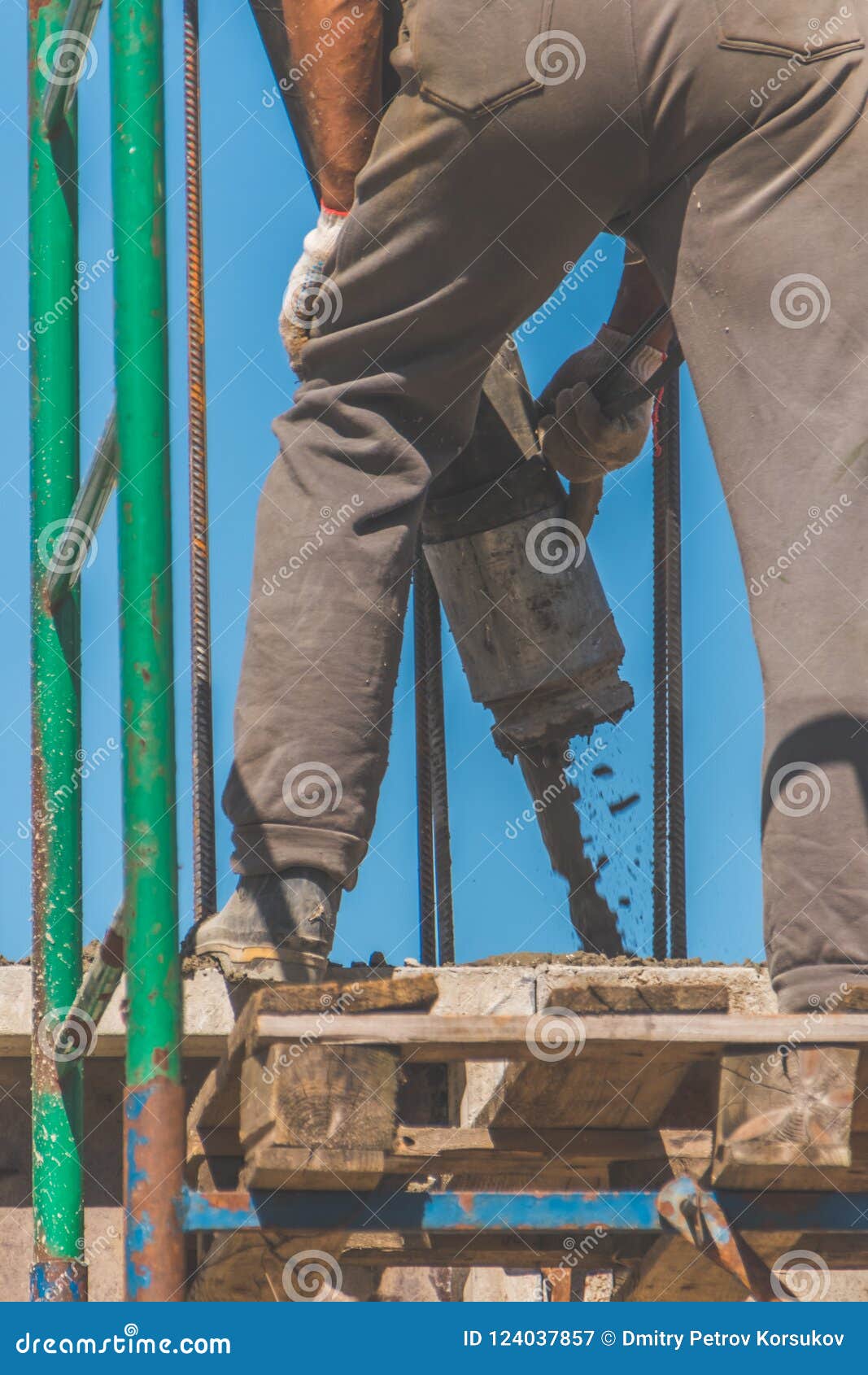 The Construction, Cement Pouring with Machine into the Frame of Stock ...