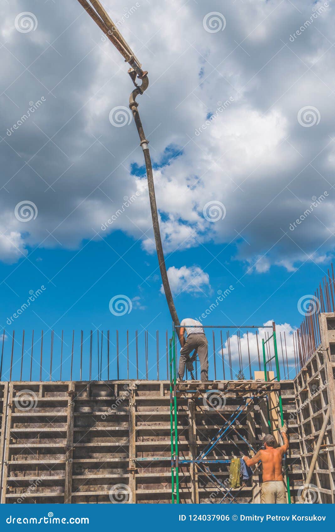 The Construction, Cement Pouring with Machine into the Frame of Stock ...
