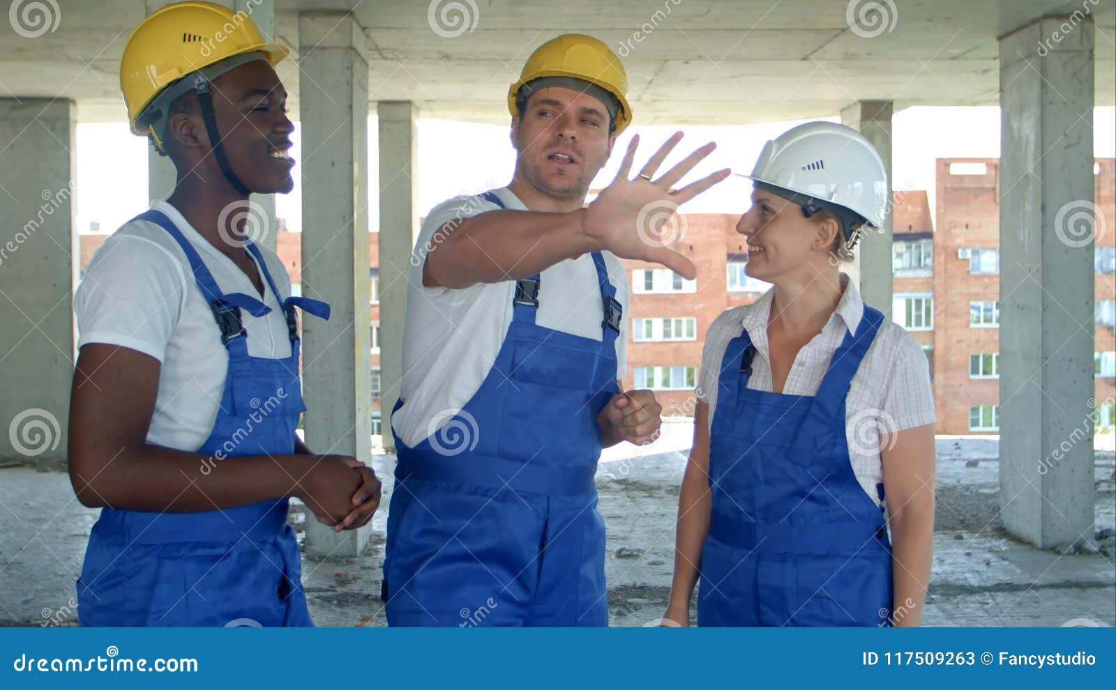Construction Co-workers Discussing about Work Plan Construction Site ...
