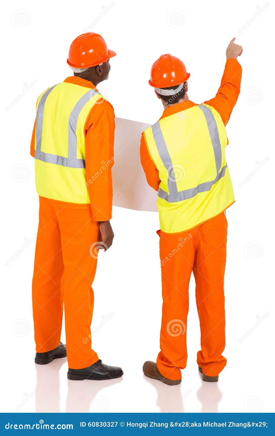 Construction Co-workers Pointing Stock Image - Image of blue, back ...