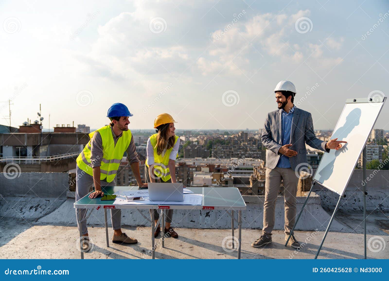 Construction Concept. Engineers and Architects Working at Construction ...