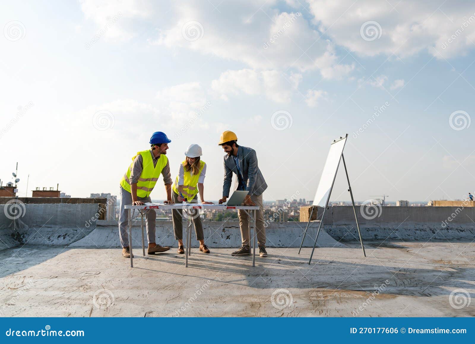 Construction Concept. Engineers and Architects Working at Construction ...