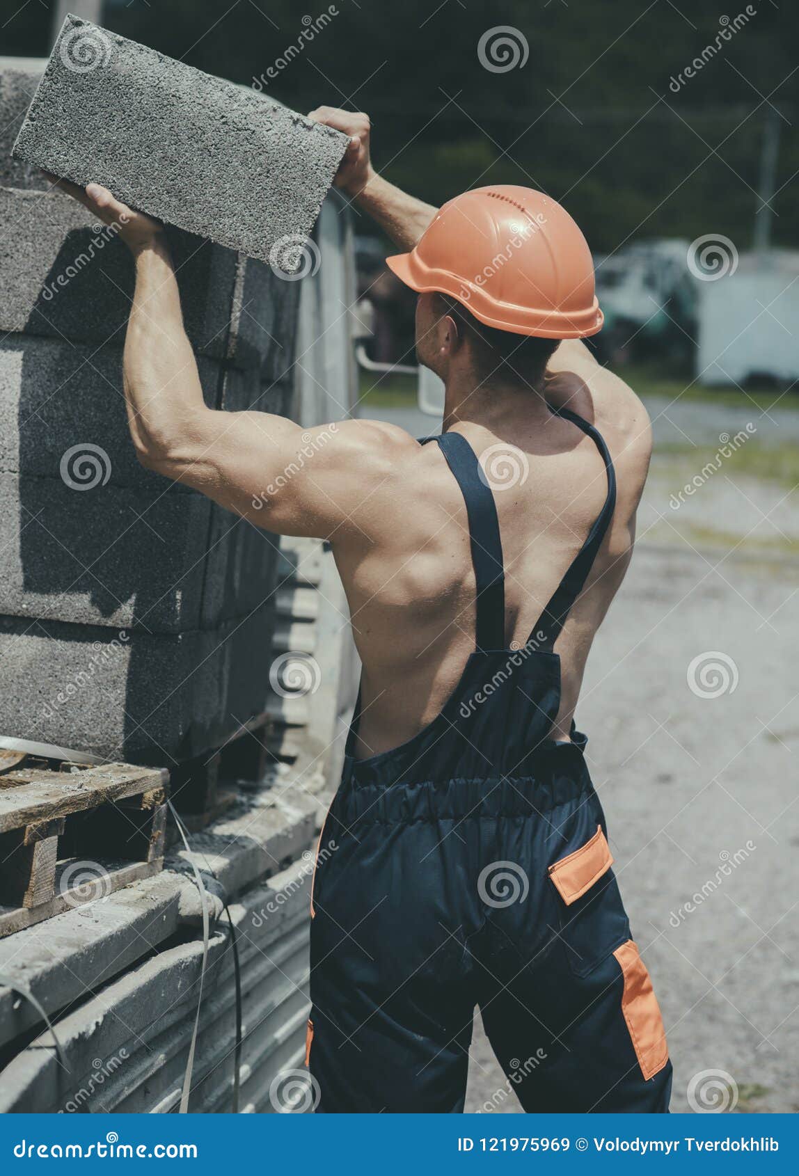 Construction Concept. Man Carry Bricks for Construction Works. Builder ...