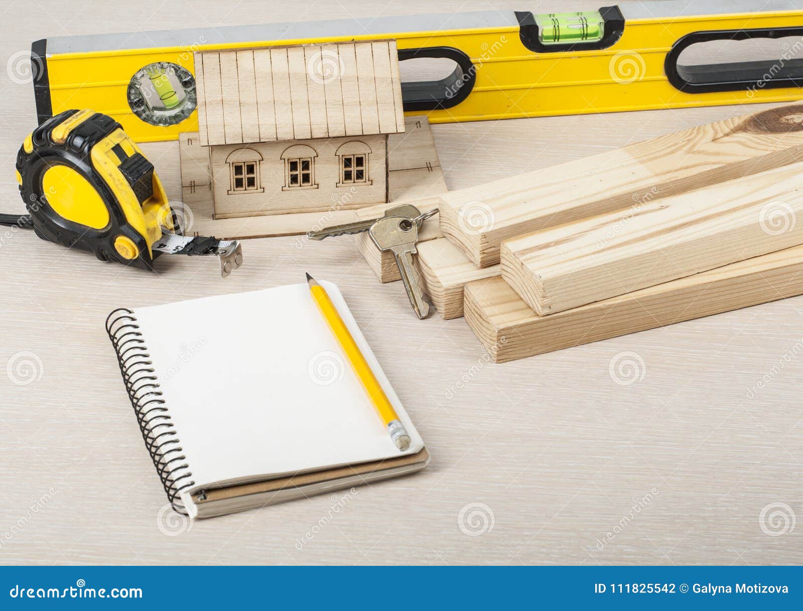 Construction Concept. Model House,work Tools and Notepad with Pencil on ...