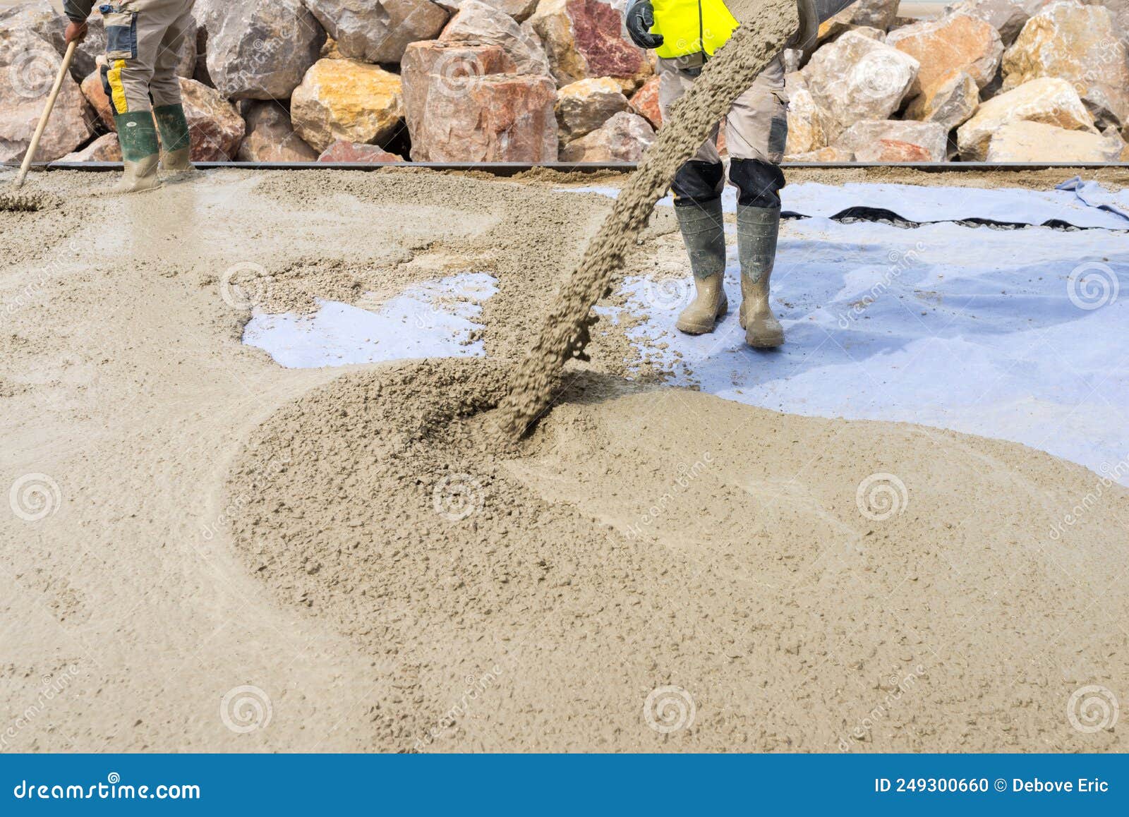 Worker Pouring Concrete on a Construction Site Stock Photo - Image of ...