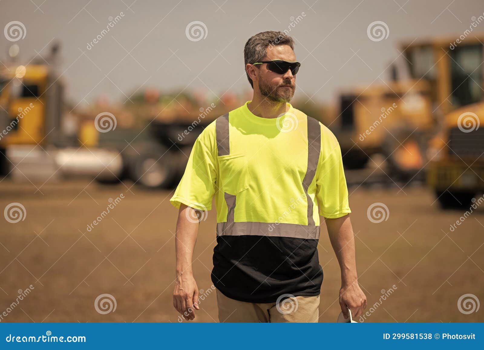 Construction Contractor Walking and Overseeing the Building. Contractor ...