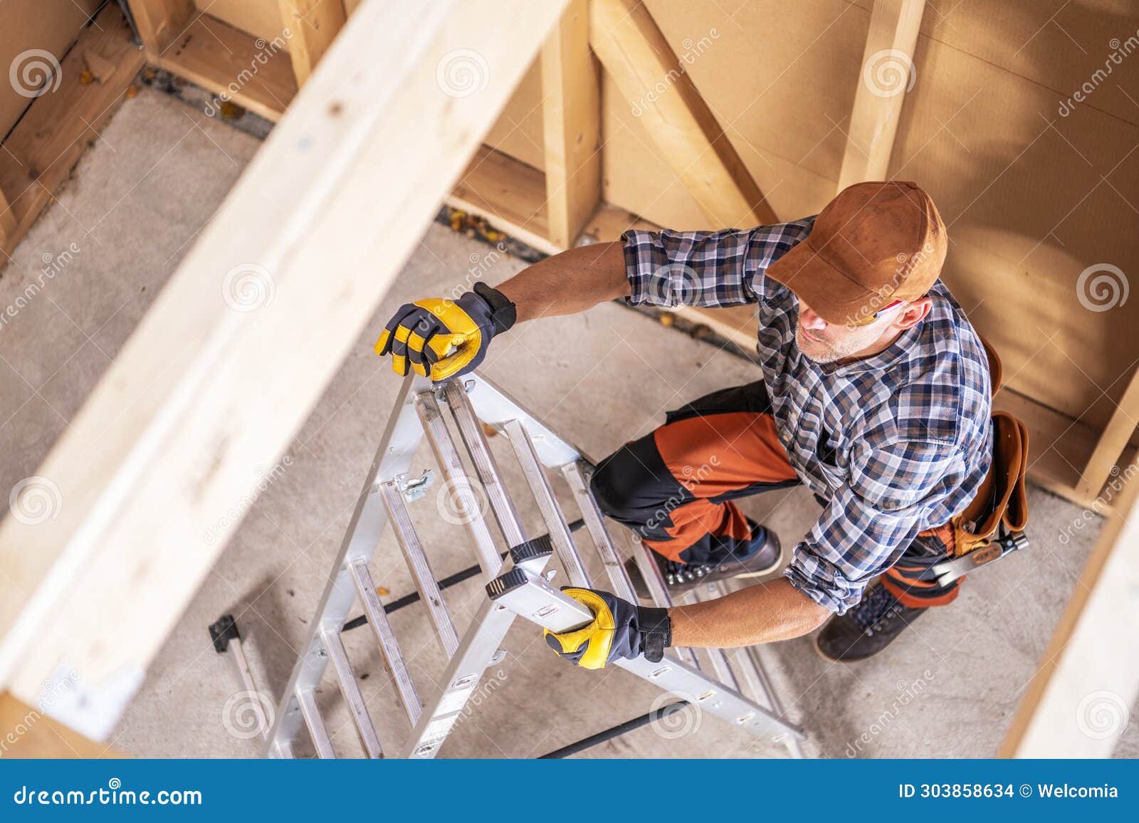 Construction Contractor Worker Climbing on a Ladder Stock Photo - Image ...
