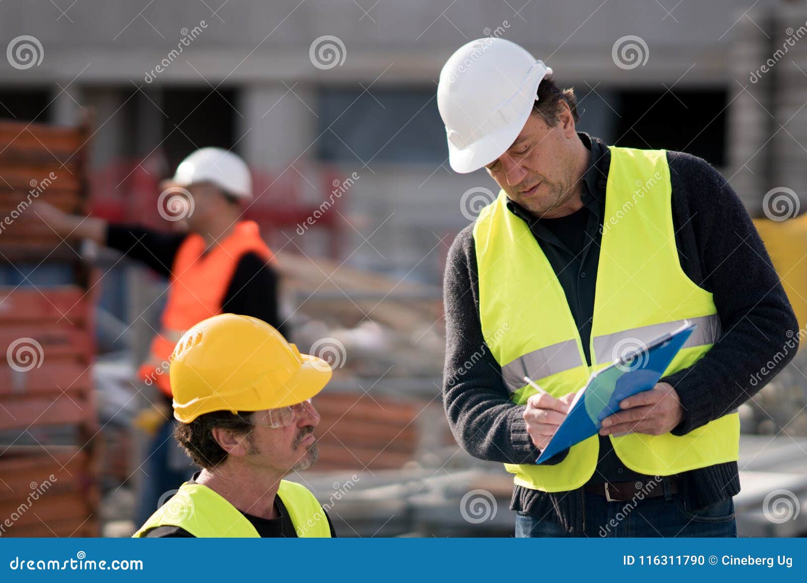 Construction Coworkers at Work Stock Photo - Image of equipment ...
