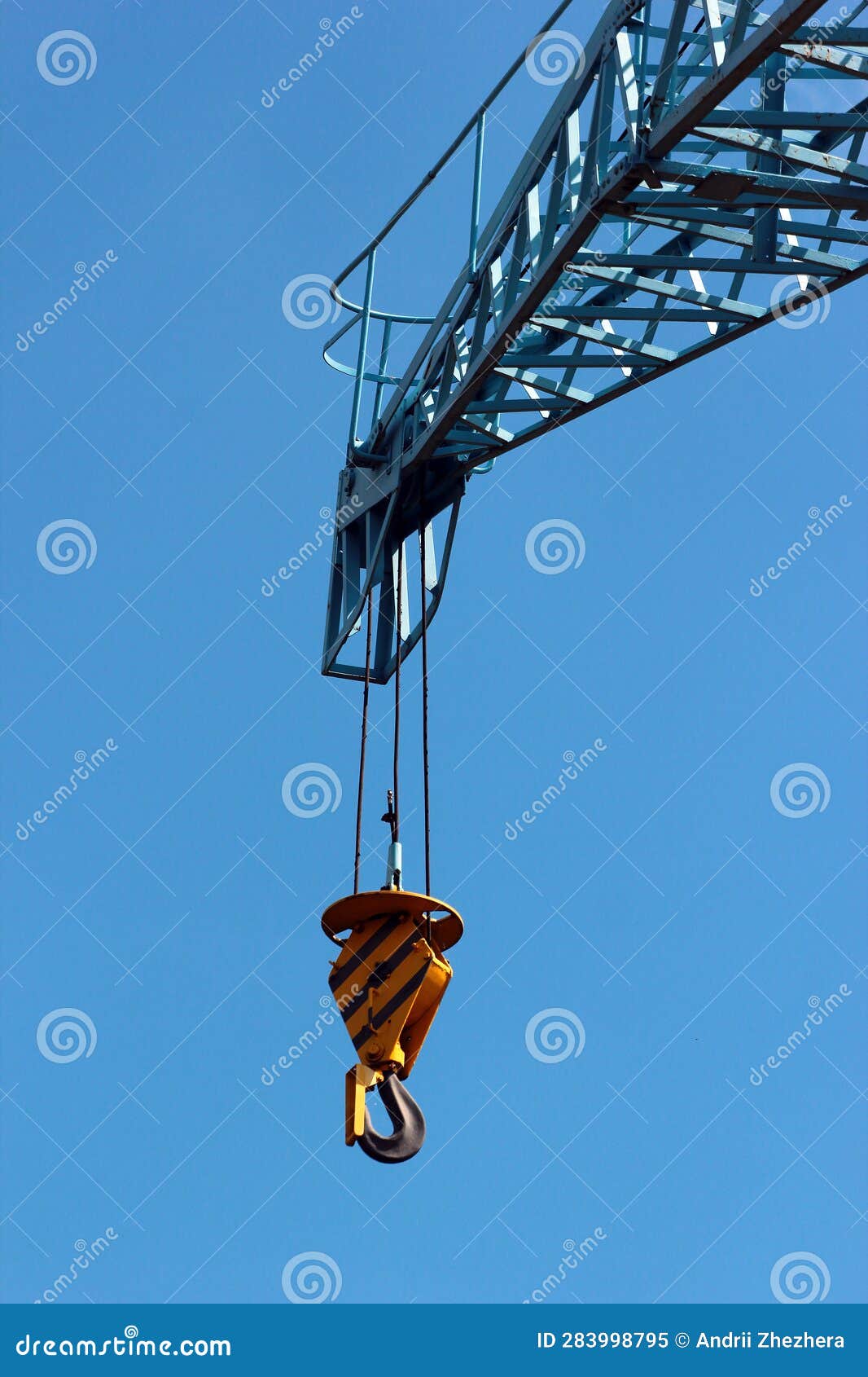 Construction Crane Arm with Hook Against Blue Sky Background Stock ...