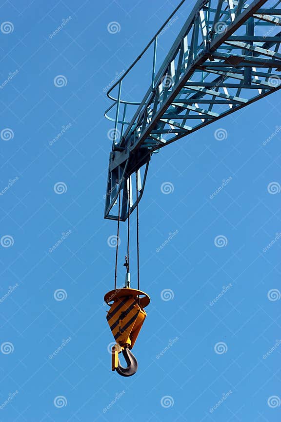 Construction Crane Arm with Hook Against Blue Sky Background Stock ...
