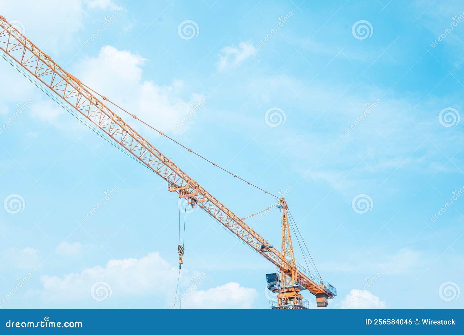 Construction Crane on the Background of Bright Blue Sky Stock Photo ...