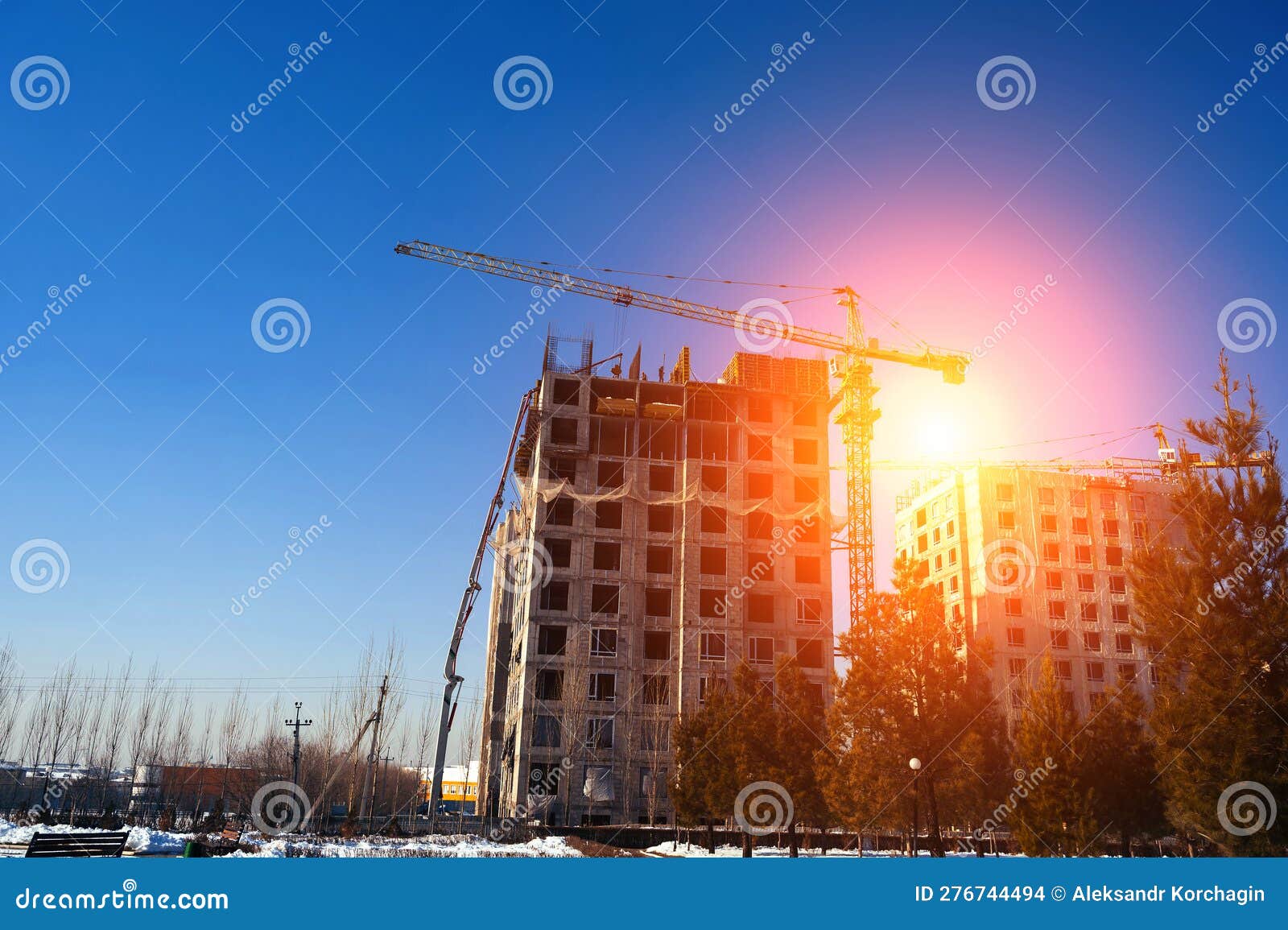 Construction Crane is Building a House on Background of a Blue Sky ...