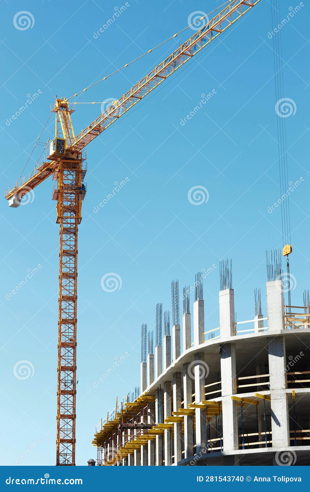 Construction Crane Builds a Tall Building Stock Photo - Image of ...