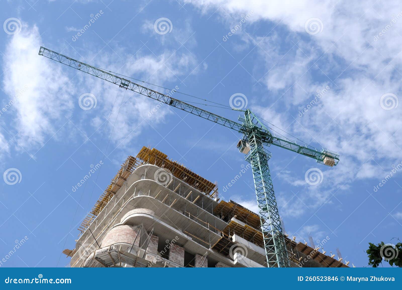 Construction Crane during the Construction of a High-rise Building ...
