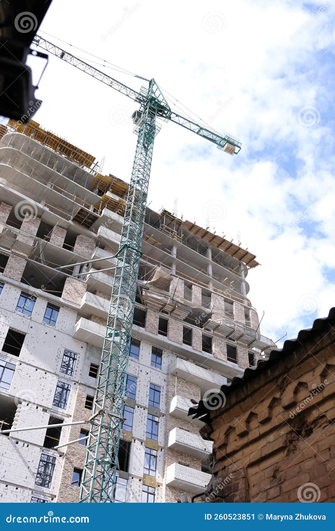 Construction Crane during the Construction of a High-rise Building ...