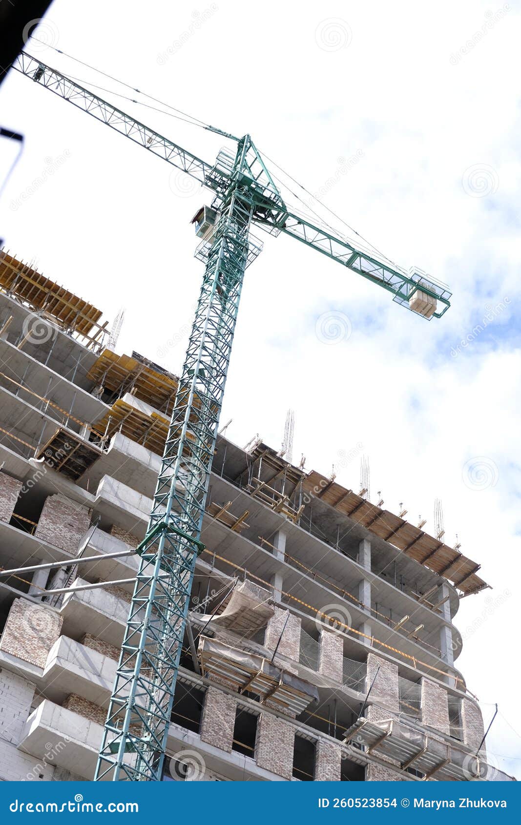Construction Crane during the Construction of a High-rise Building ...
