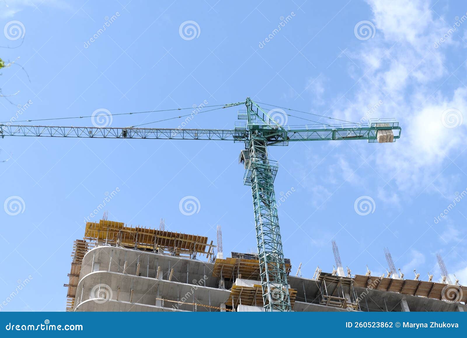 Construction Crane during the Construction of a High-rise Building ...