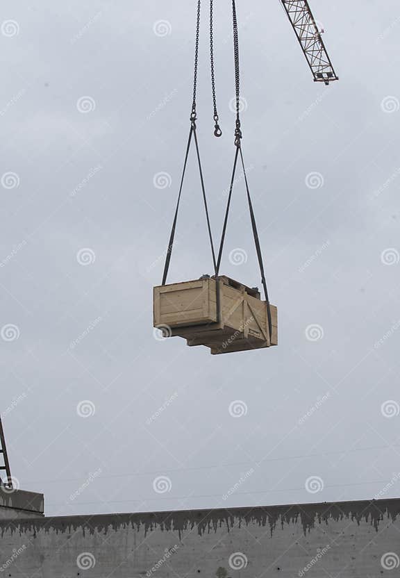 Construction Crane with Heavy Load Stock Photo - Image of site, cranes ...