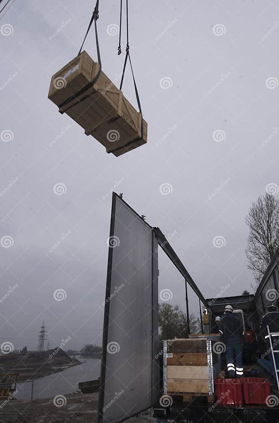 Construction Crane with Heavy Load Stock Image - Image of mobile, load ...