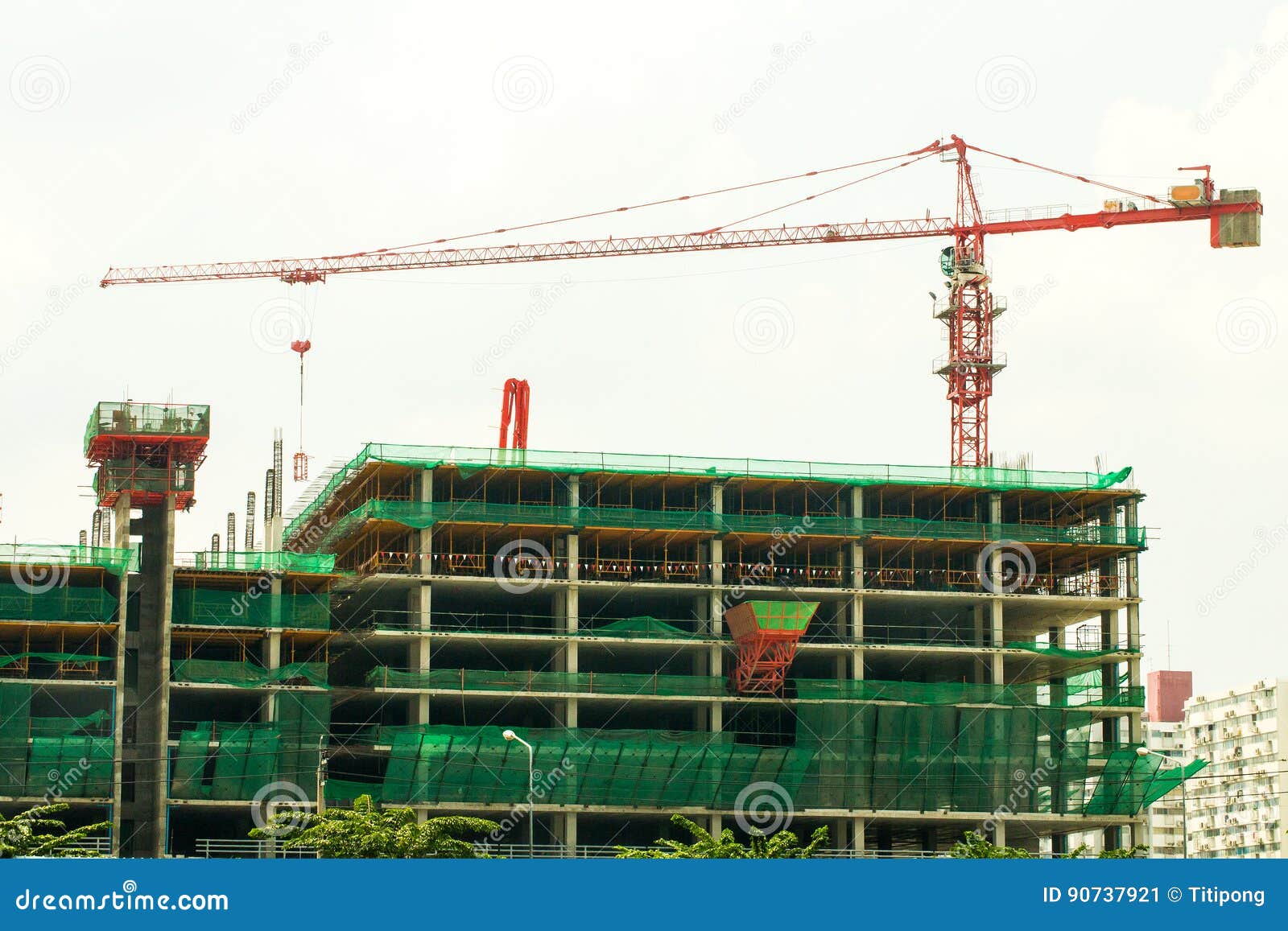 Construction Crane on a High Rise Building. Stock Image - Image of ...