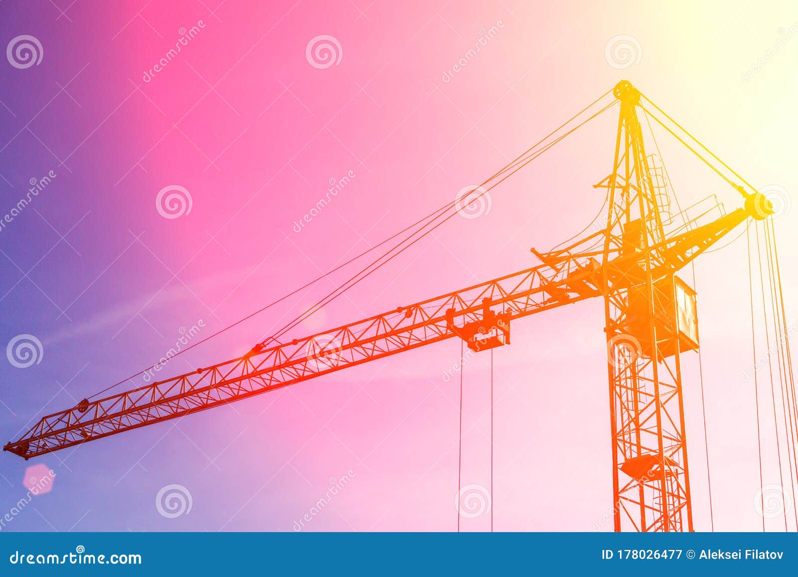 Construction Crane Self-erection Crane at Sunset. Construction ...