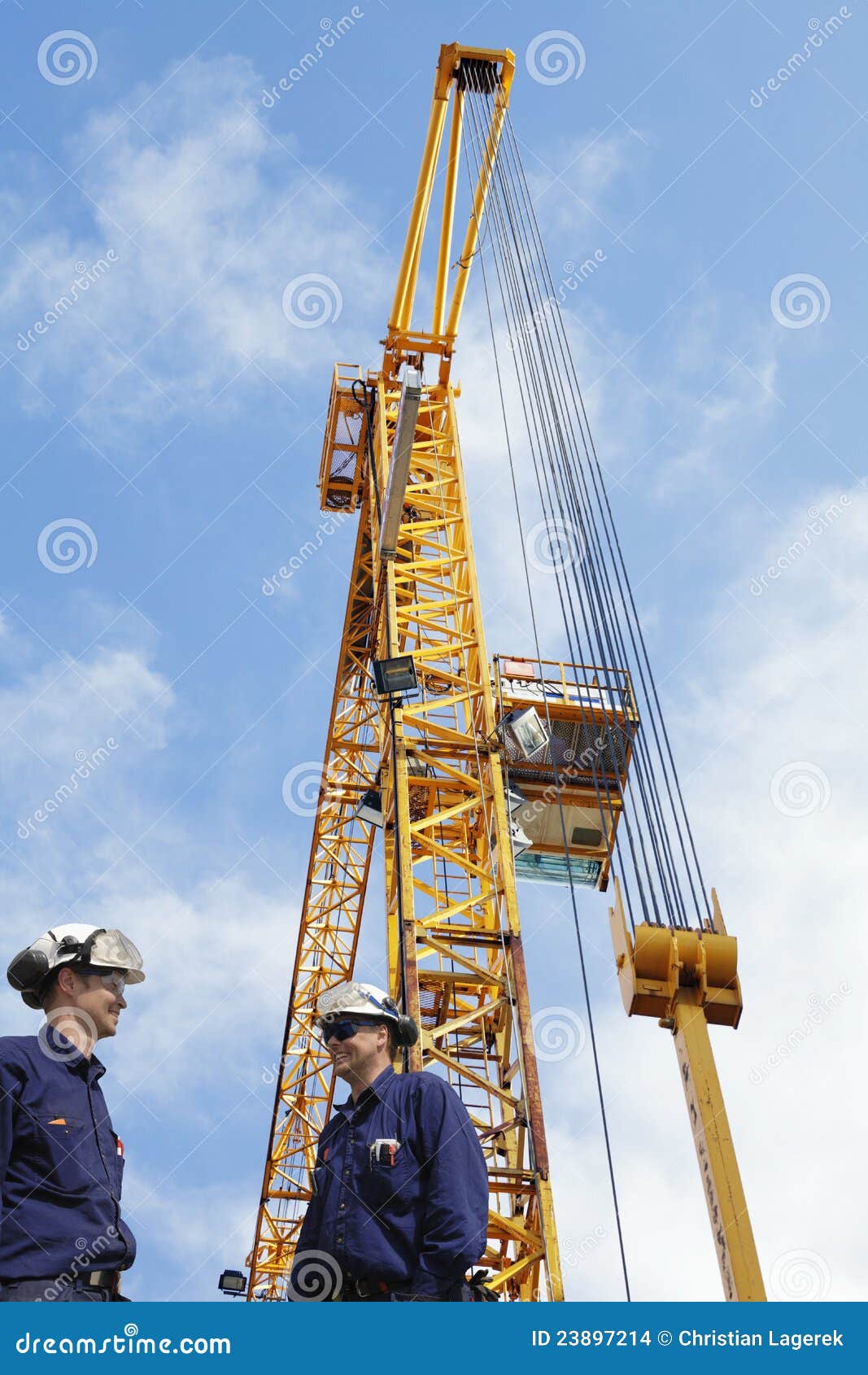 Construction Crane with Workers Stock Photo - Image of crane, cranes ...
