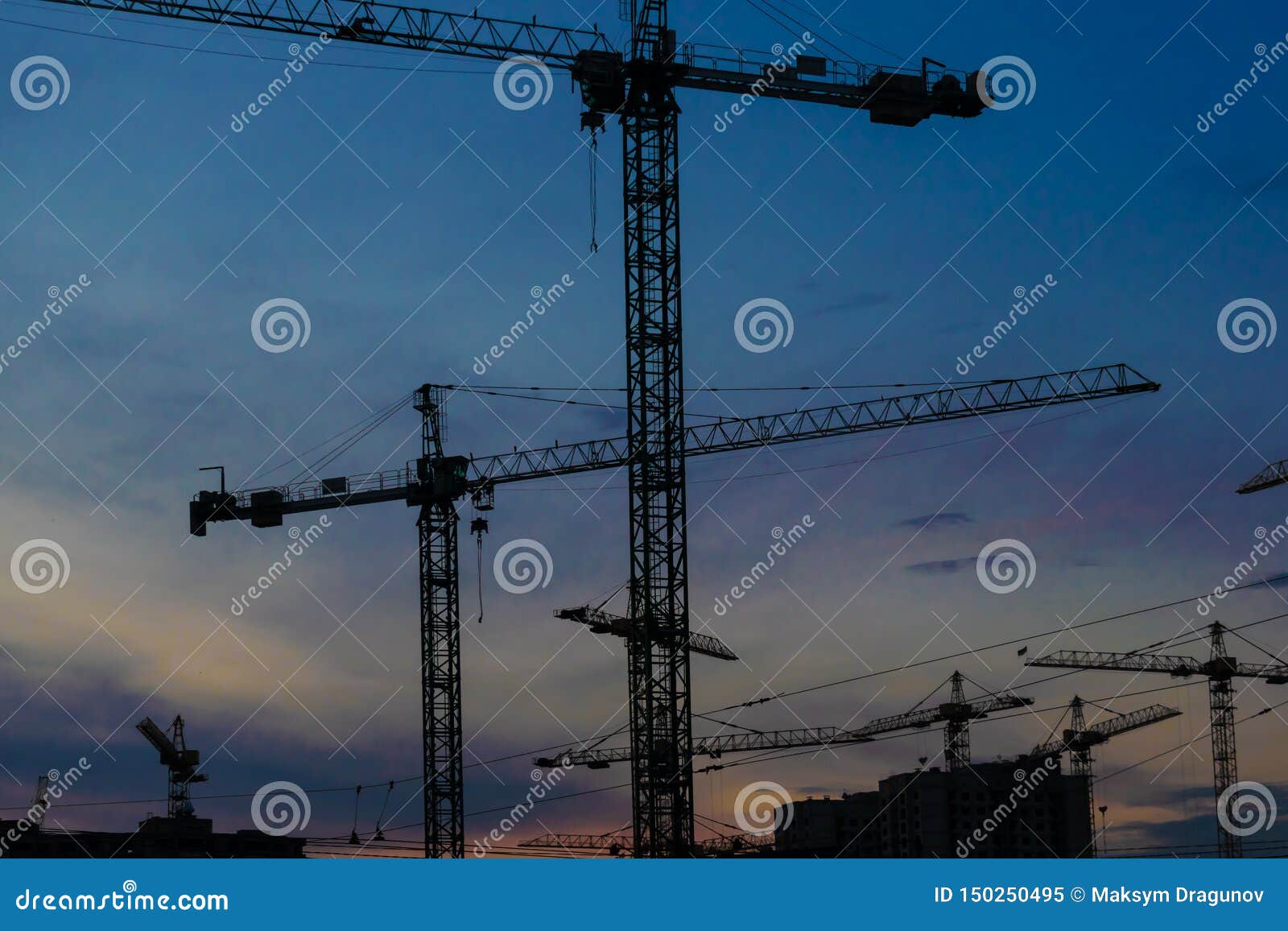 Construction Cranes on Sunset Stock Image - Image of equipment ...