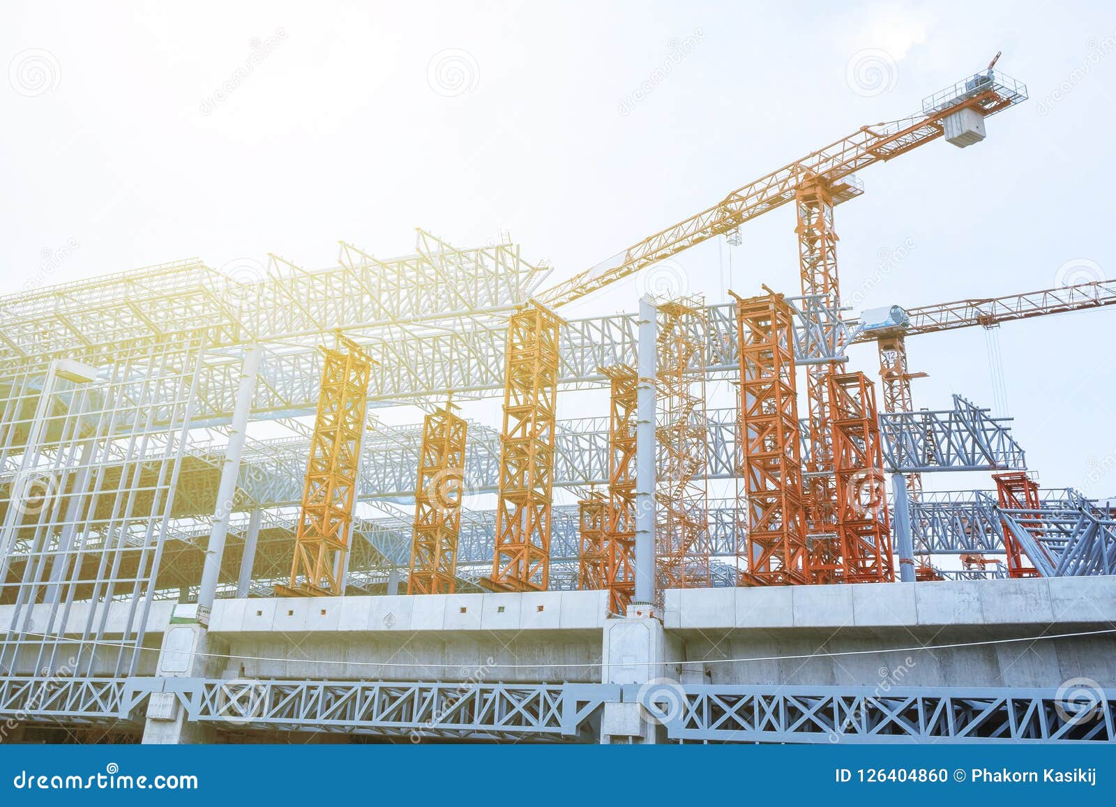 Construction Cranes in Working on a Big Construction Work Site. Stock ...