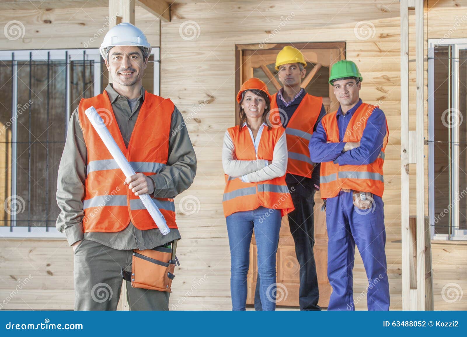Construction Crew Working In The Summer On The Construction Of A Brick ...