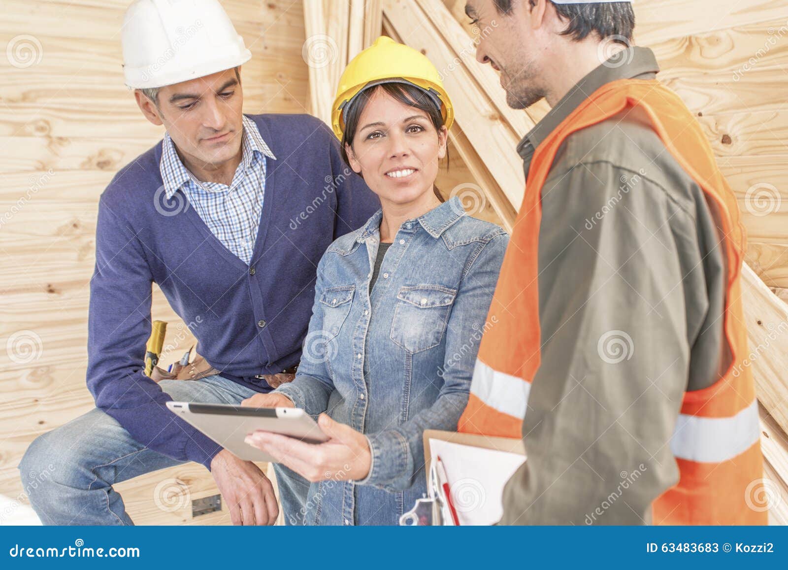 Construction Crew Working In The Summer On The Construction Of A Brick ...