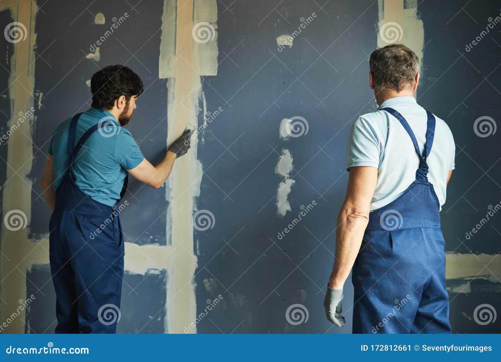 Construction Crew at Work stock image. Image of redecoration - 172812661