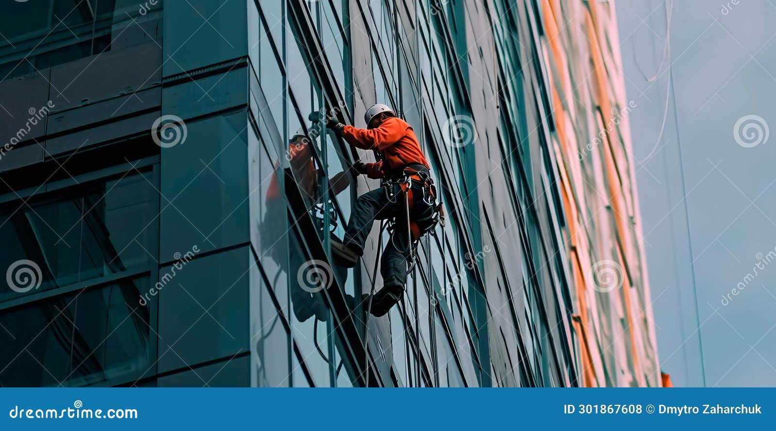 Construction Crew Working on a High-rise Building Suspended in the Air ...