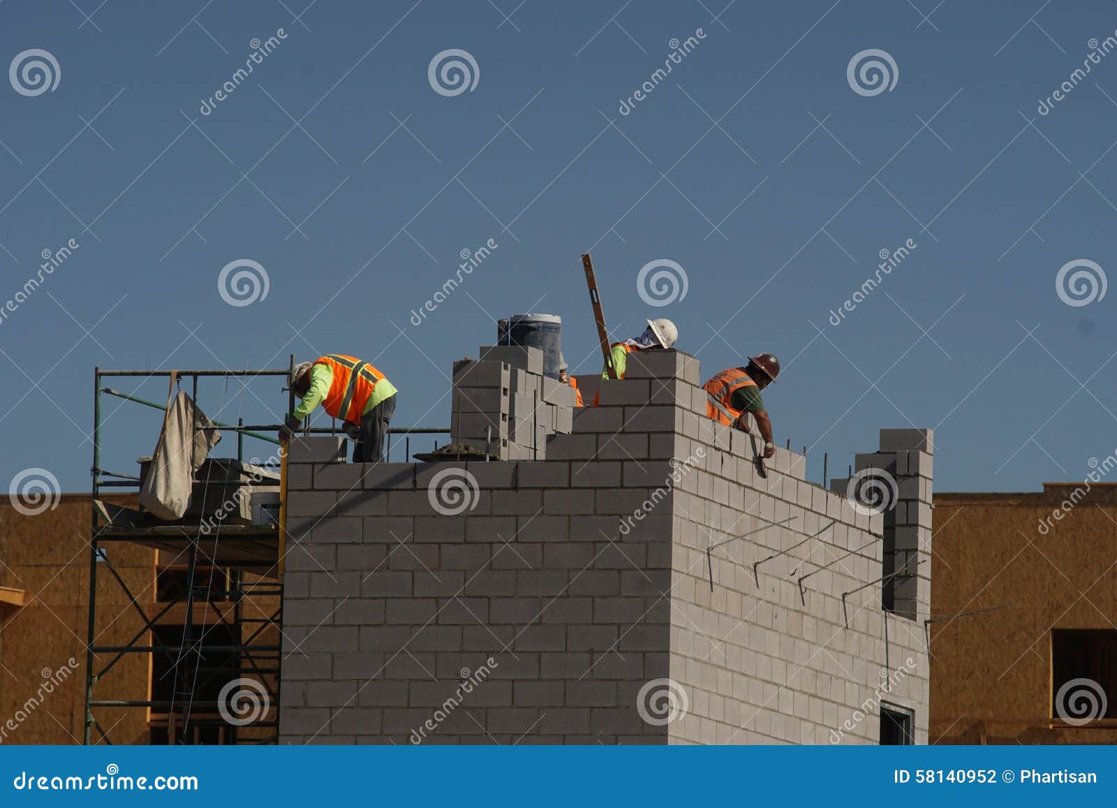 Construction Crew Working on New Building Stock Photo - Image of ...