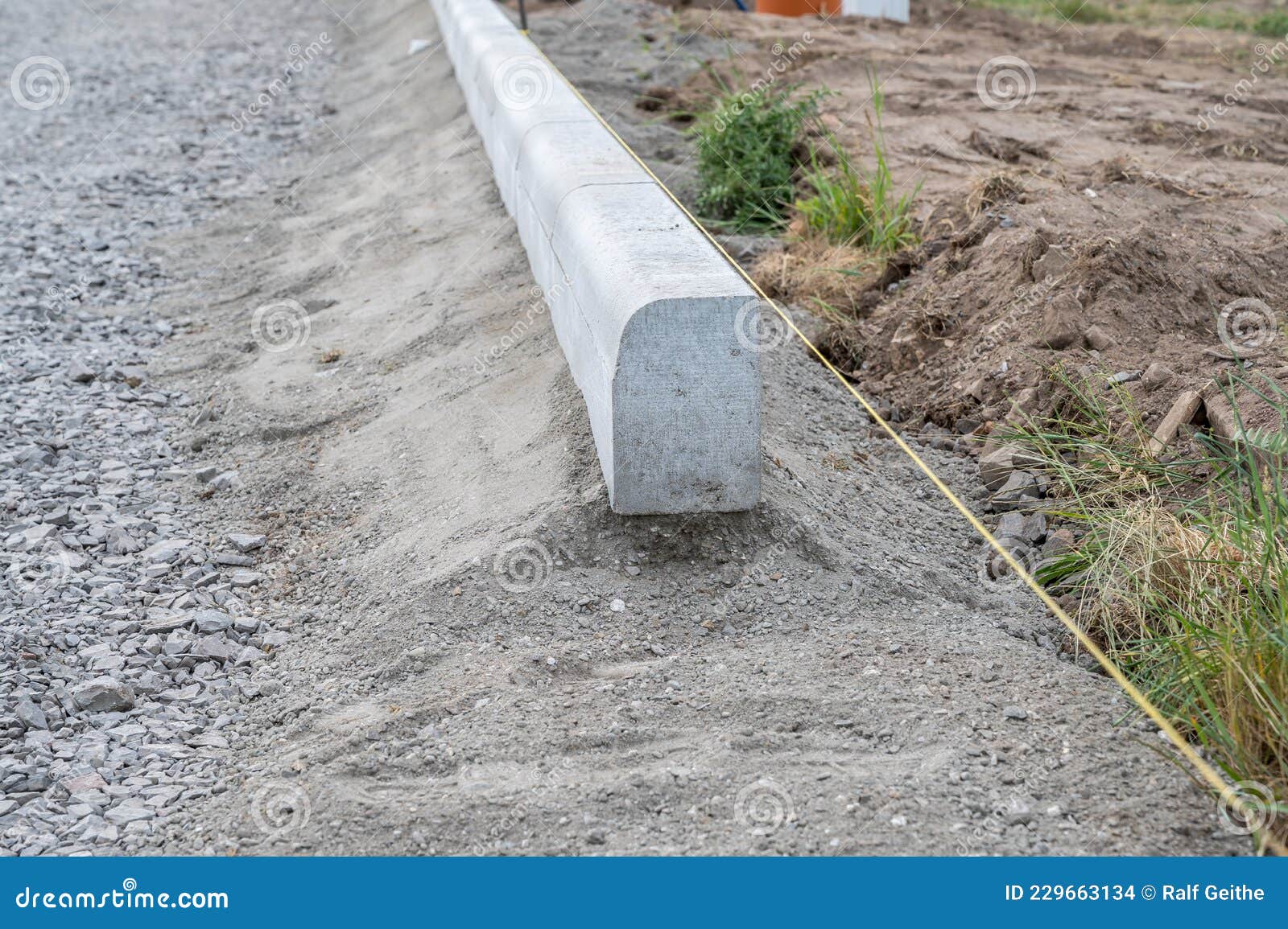 Construction of Curbs on the Edge of a Sidewalk with the Help of a ...