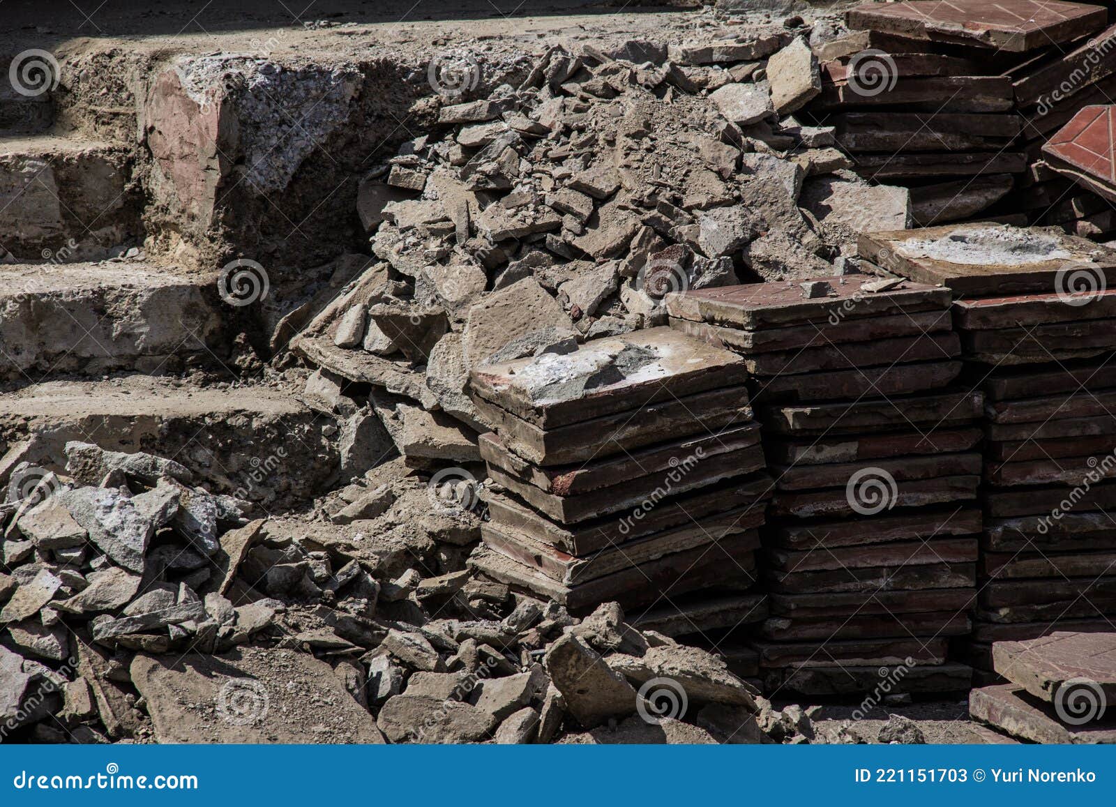 Construction Debris and Broken Ceramic Tiles are Piled Next To the ...