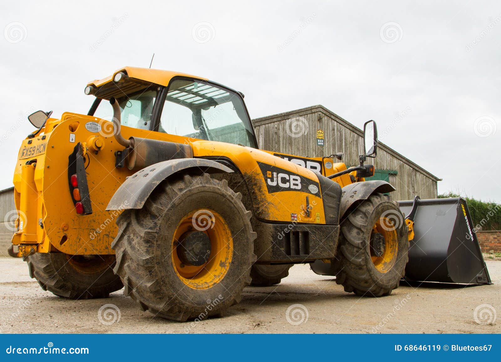 Construction Digger Loader in Farm Yard with Barn Editorial Stock Image ...