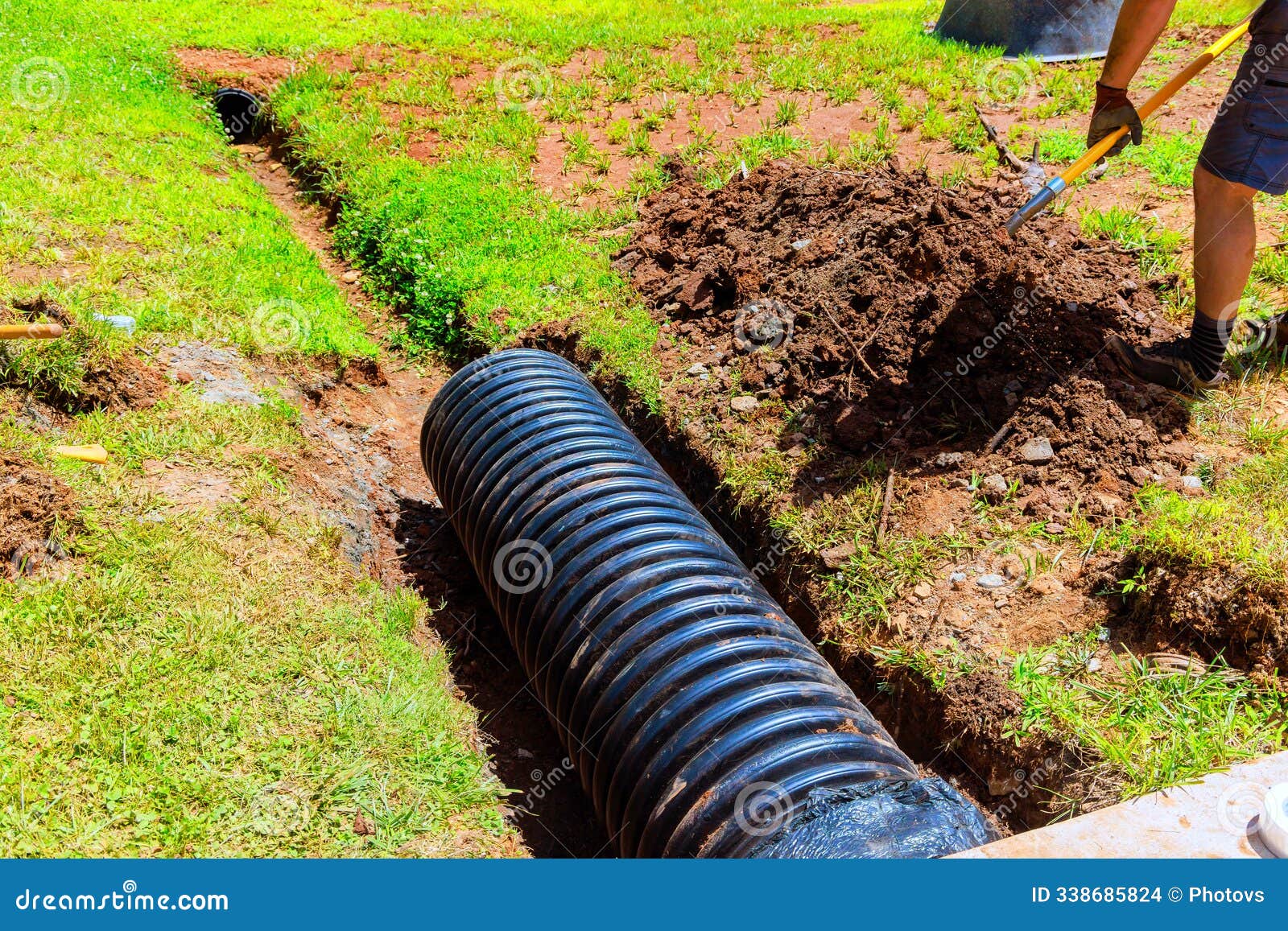 Construction Of A Drainage Ditch Along A Road With A Culvert Under The ...