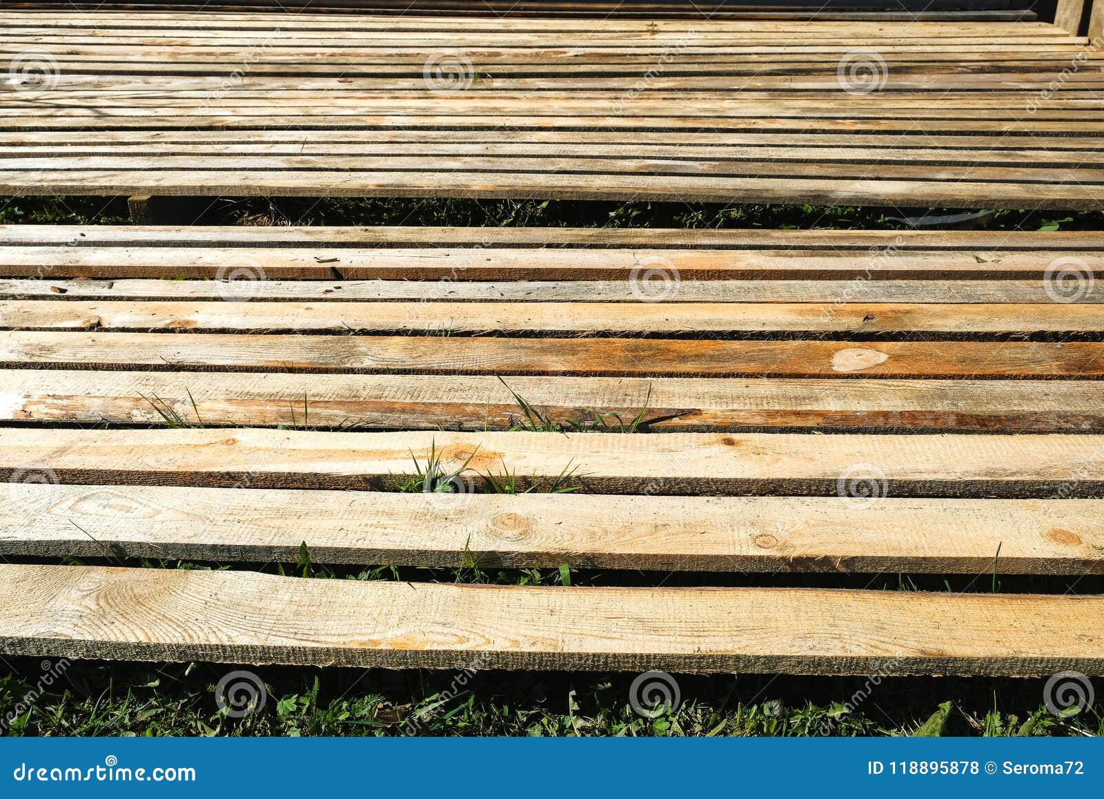Construction Edged Board on the Grass Stock Photo - Image of texture ...
