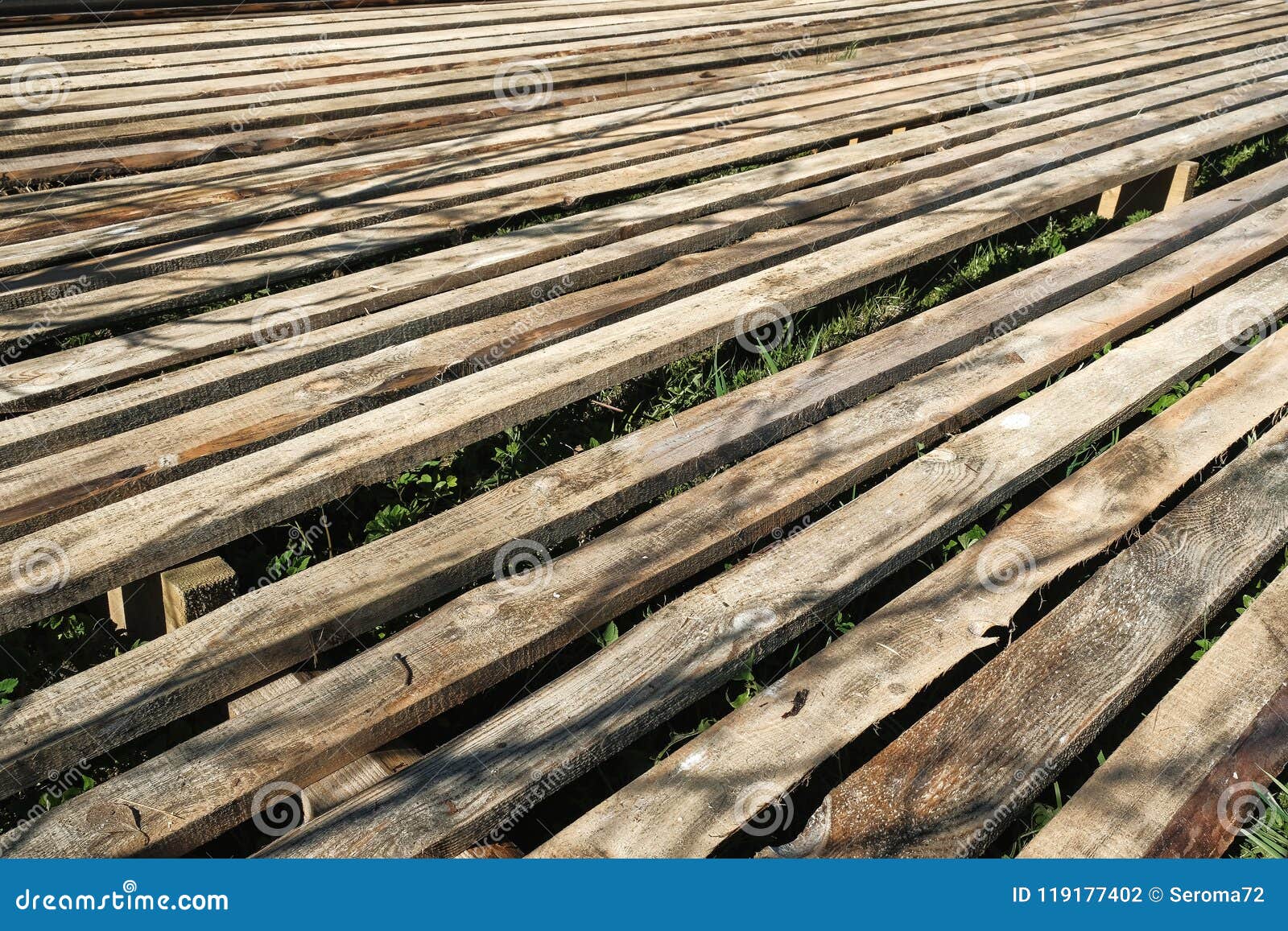 Construction Edged Board on the Grass Stock Photo - Image of carpenter ...