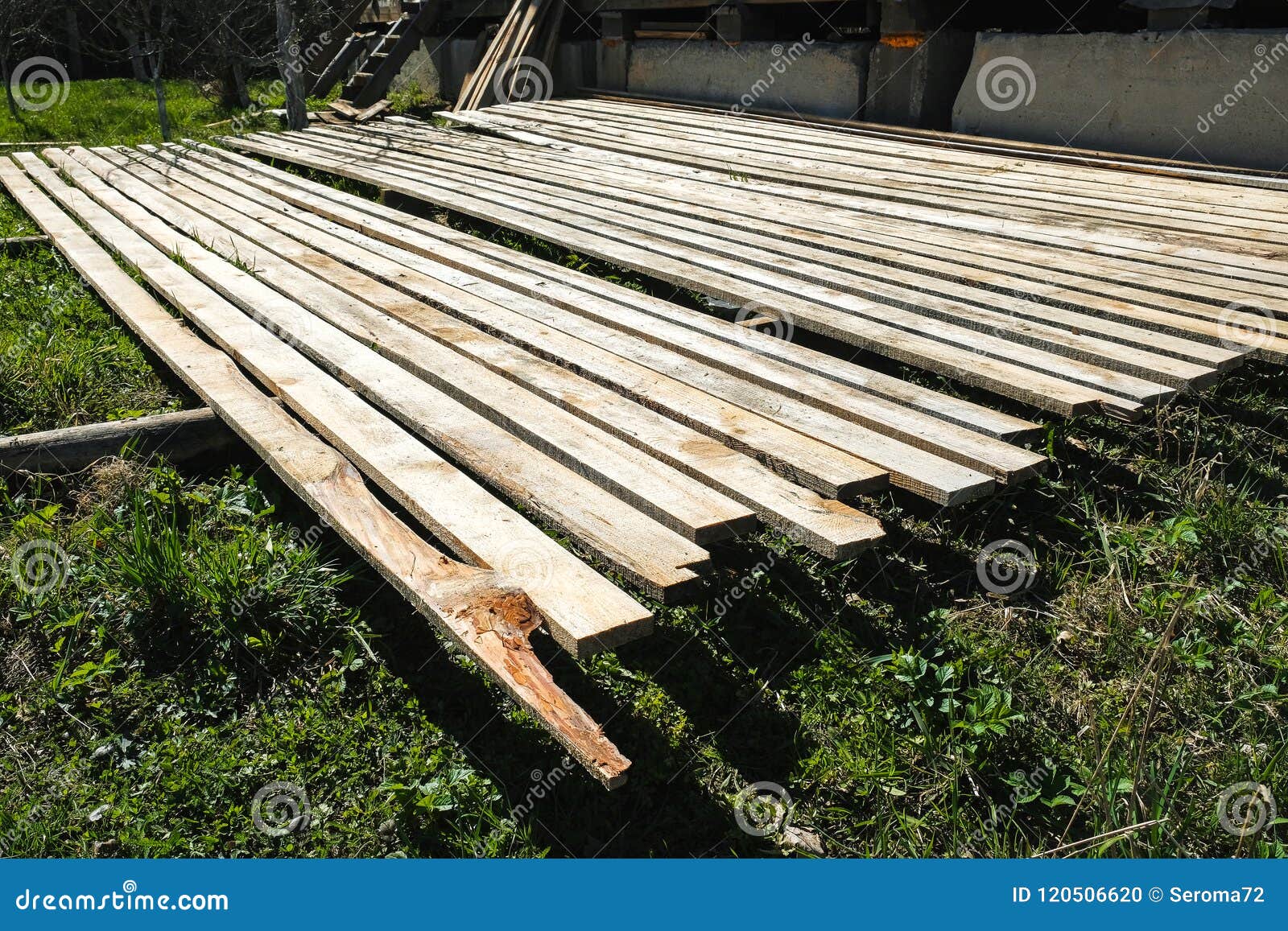 Construction Edged Board on the Grass Stock Photo - Image of drying ...