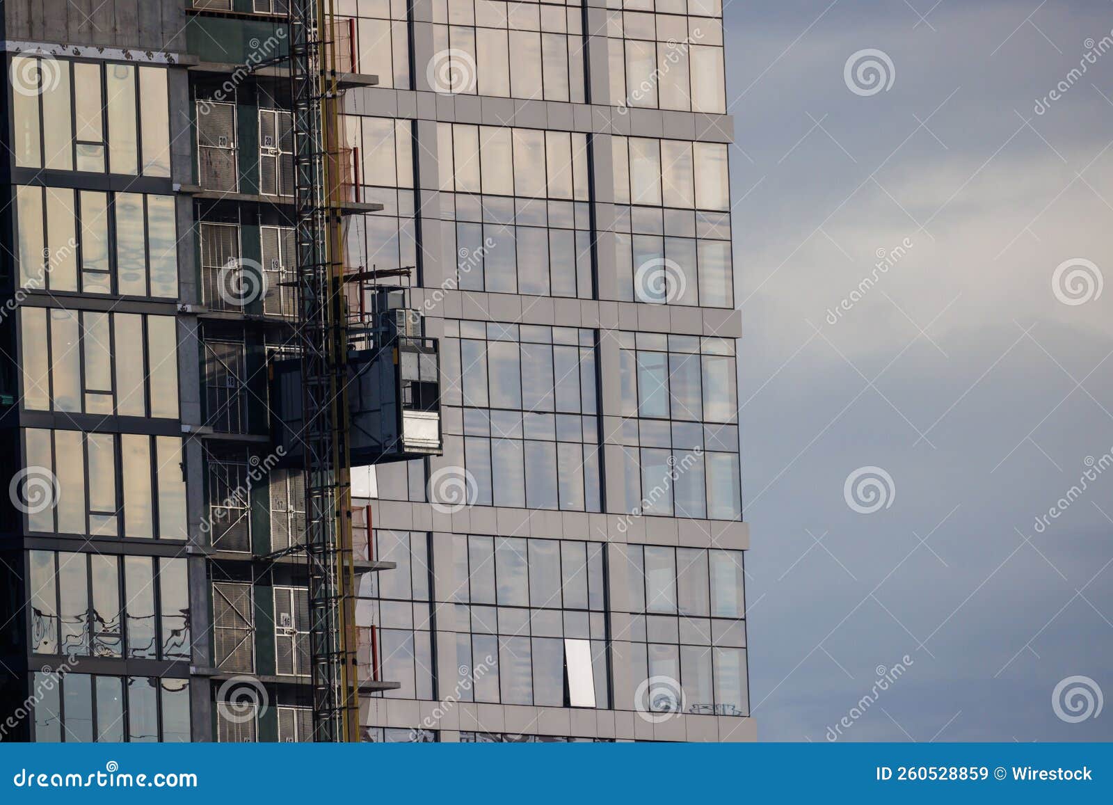 Construction Elevator on the Side of a High Rise Building Stock Image ...
