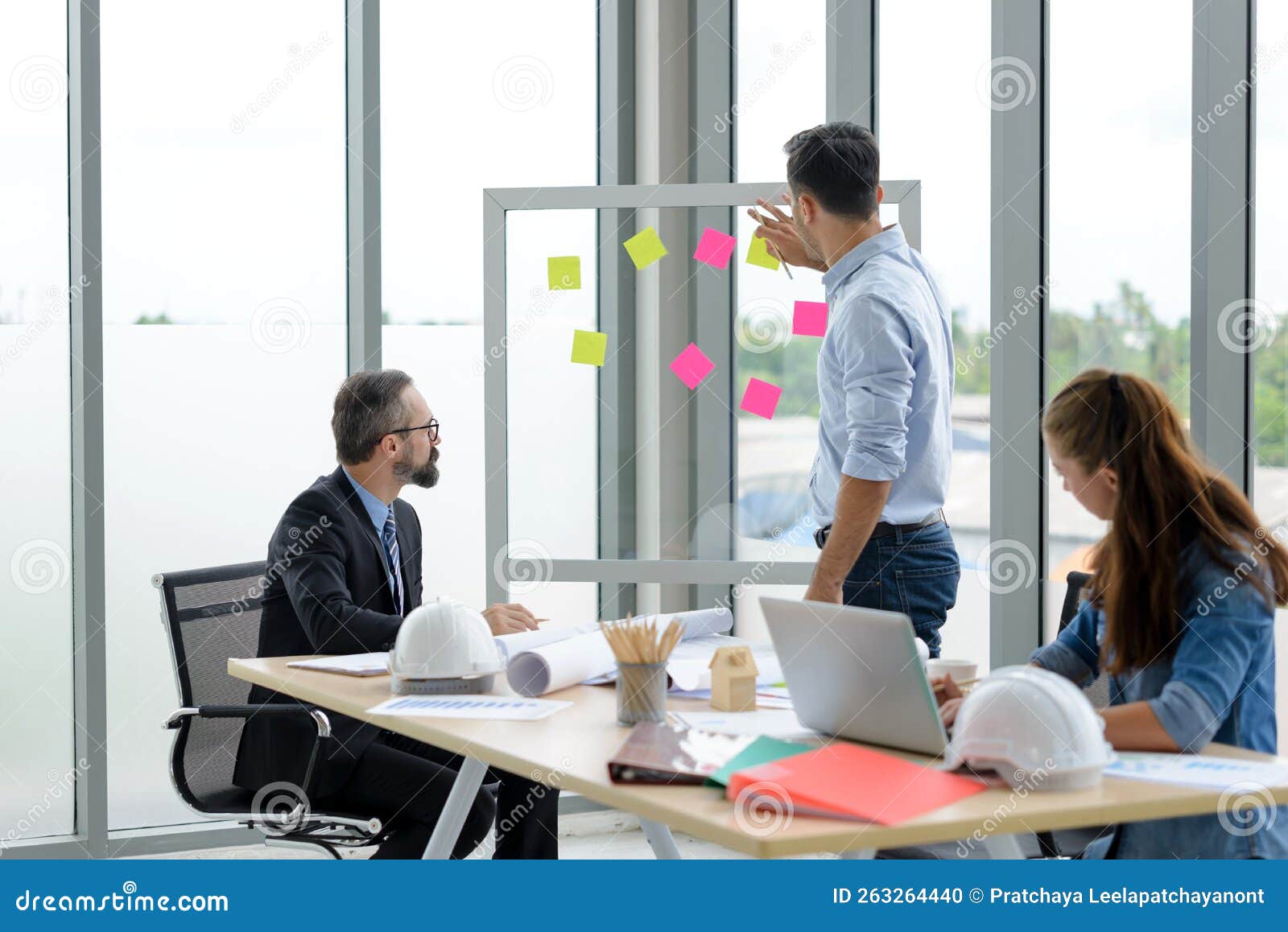 Construction Engineer and Architect Check Plan Working with the ...