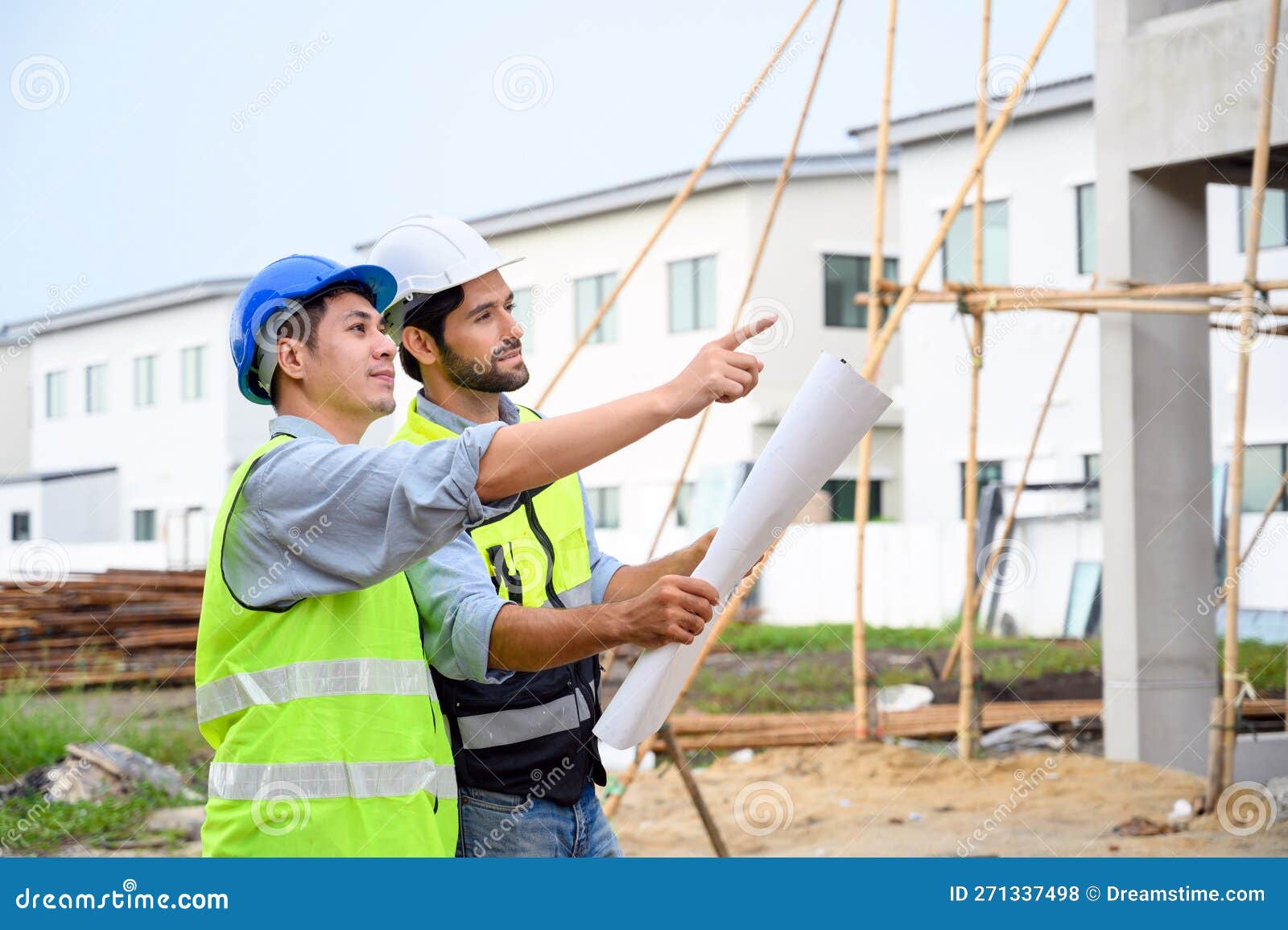 Construction Engineer and Architect Check Plan Working with the ...