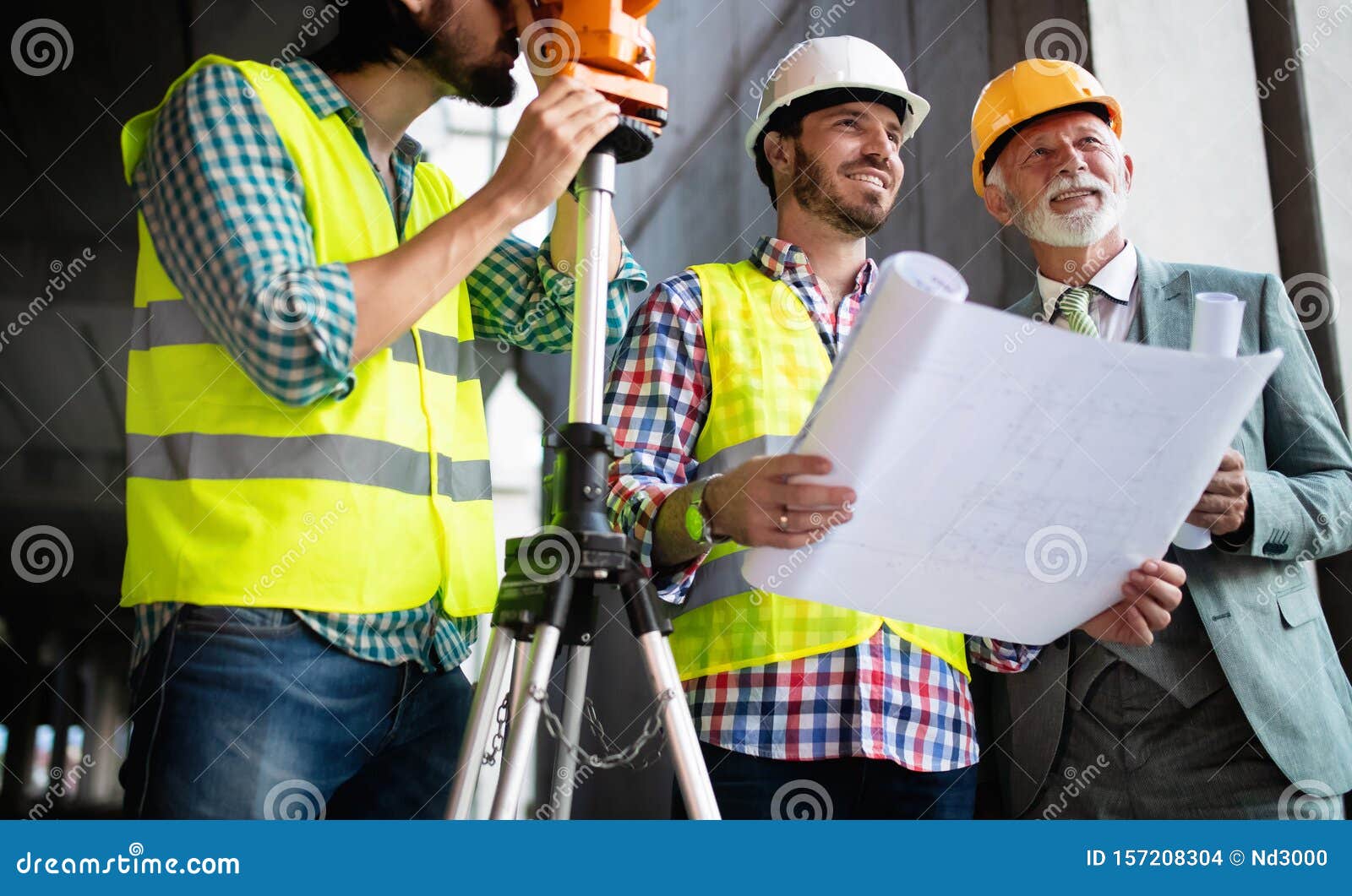 Construction Engineer with Foreman Worker Checking Construction Site ...